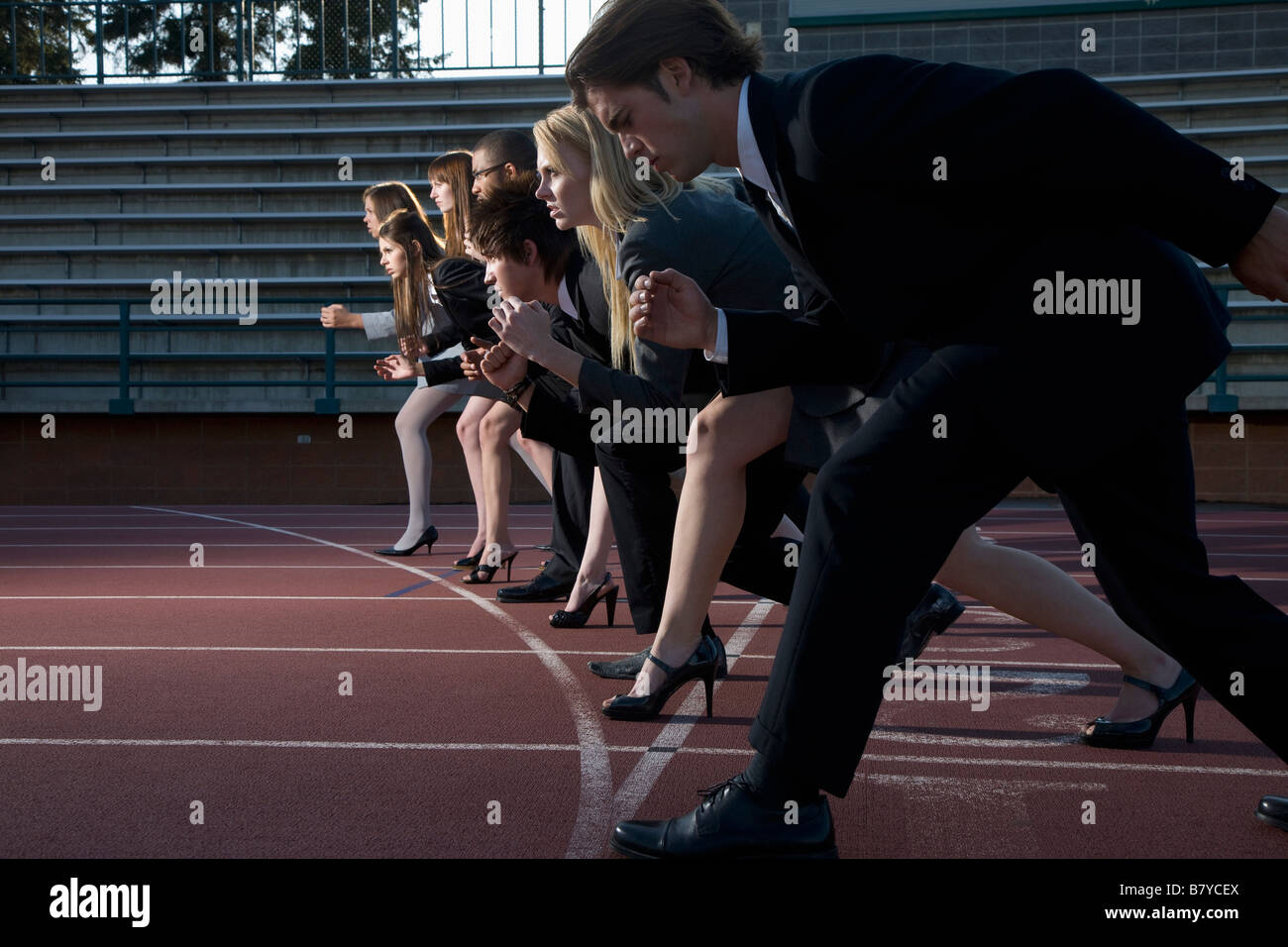 Business-people on a racetrack Stock Photo - Alamy