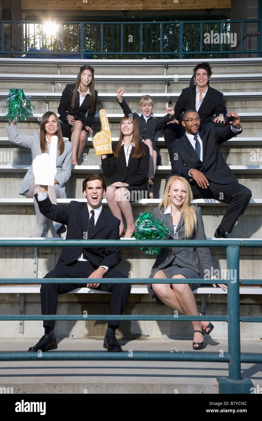Business people cheering in the stands Stock Photo - Alamy