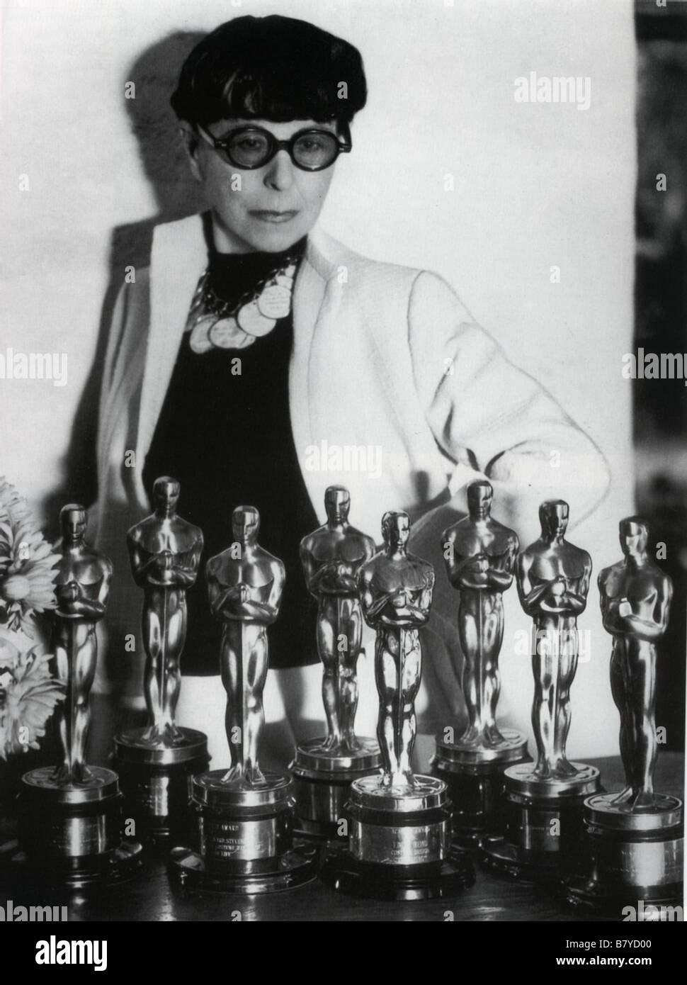 Edith Head, costume designer, behind her 8 Oscars 1974 Stock Photo - Alamy