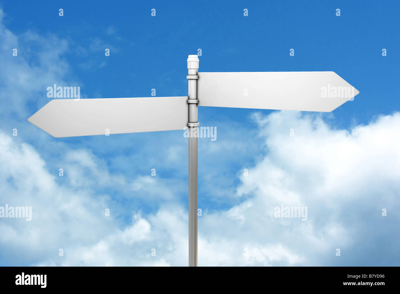 Signpost in blue sky with fluffy white clouds Stock Photo - Alamy