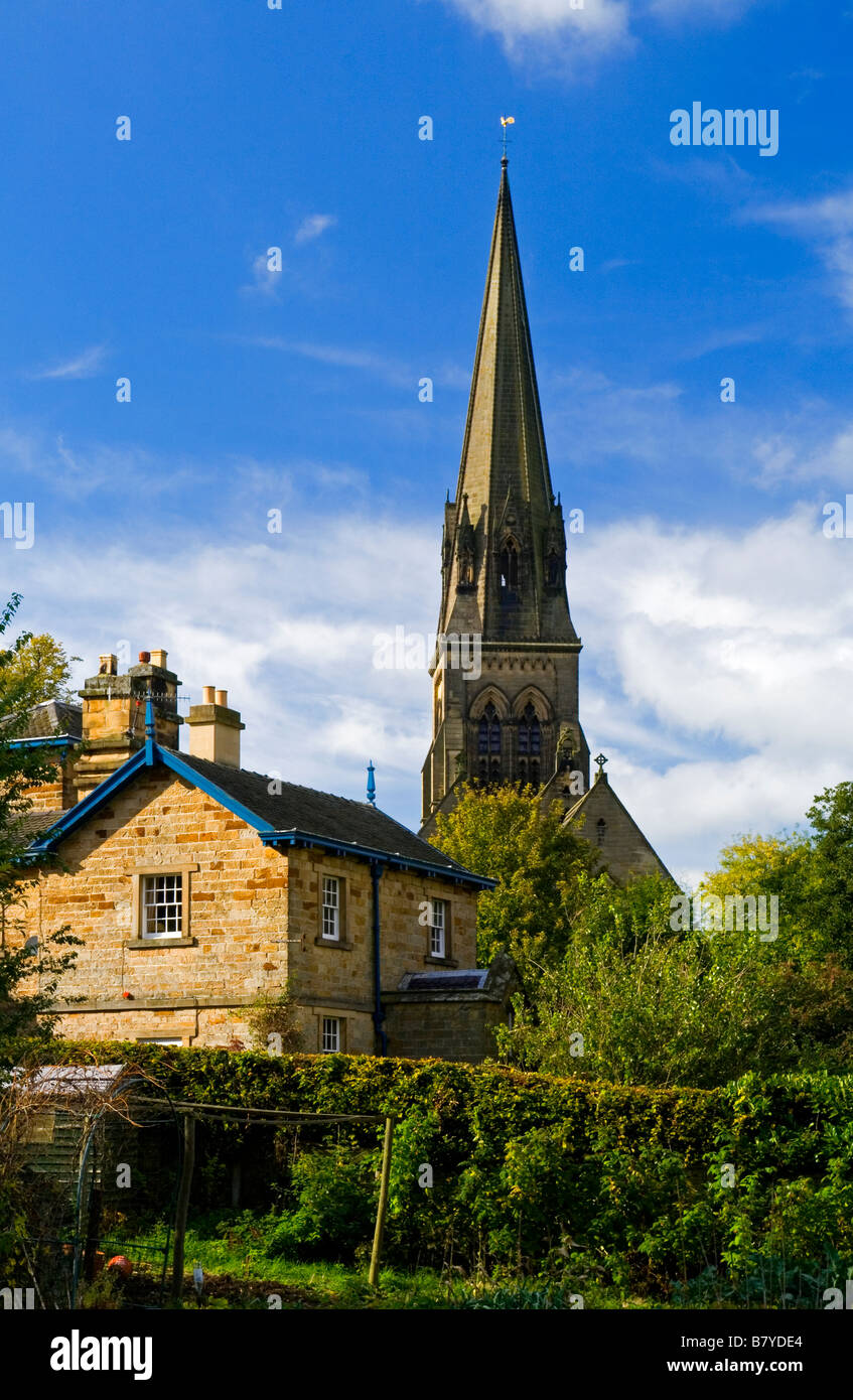 Spire of St Peter's Church in Edensor village near Bakewell in the ...