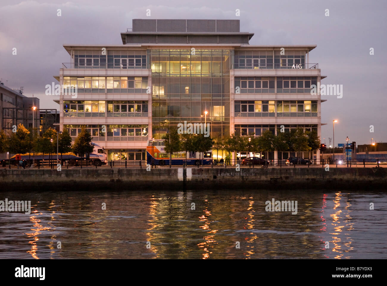 Office building and River Liffey at dusk, Docklands Dublin Ireland ...