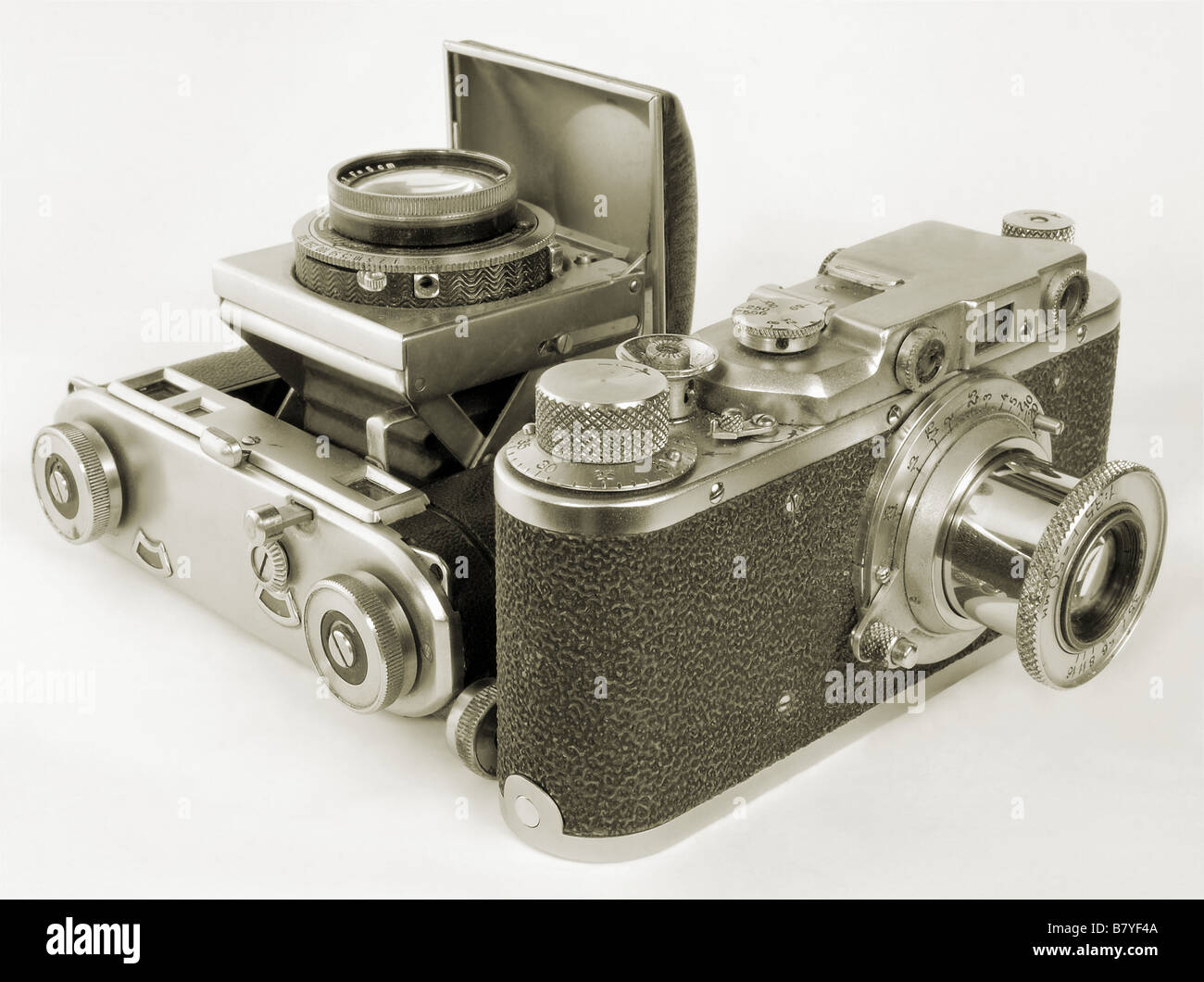 Two antiquarian 35 mm film cameras with put forward lens Stock Photo ...