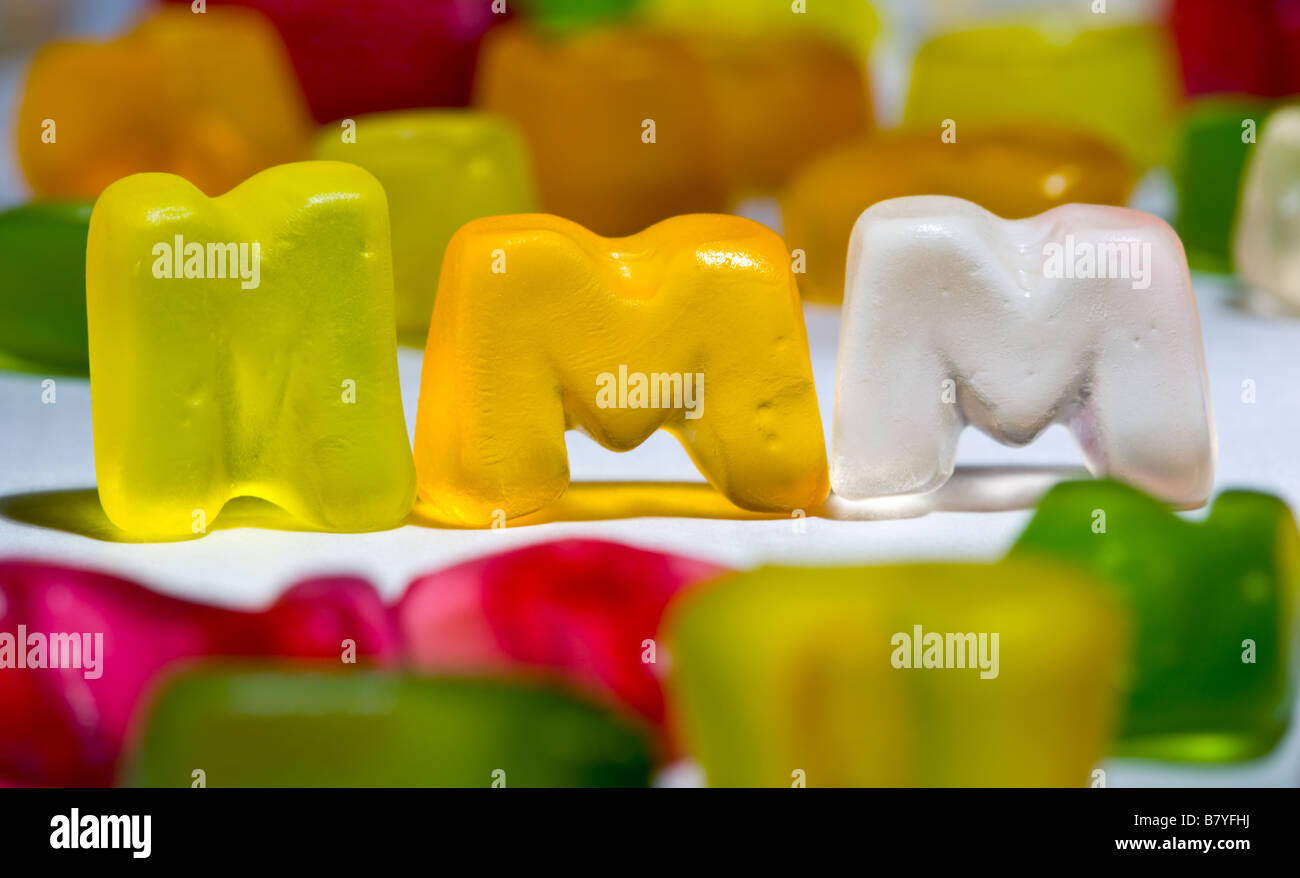 Brightly coloured sweets spelling "Mmm Stock Photo - Alamy