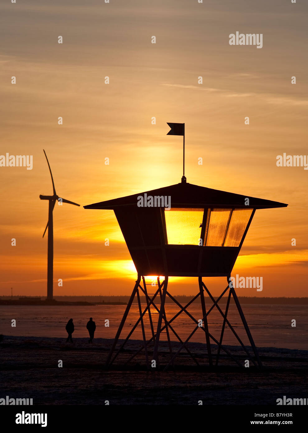 Wind turbine and lifeguard's watchtower at seashore , Finland Stock ...