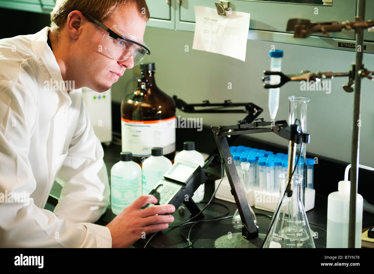 Younger Male Scientist in Lab doing science Stock Photo - Alamy