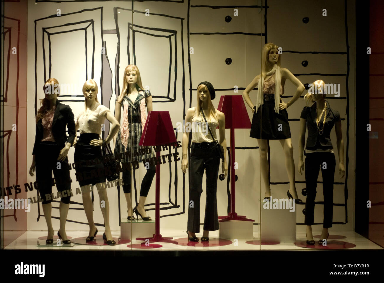 mannequins in display window Stock Photo - Alamy
