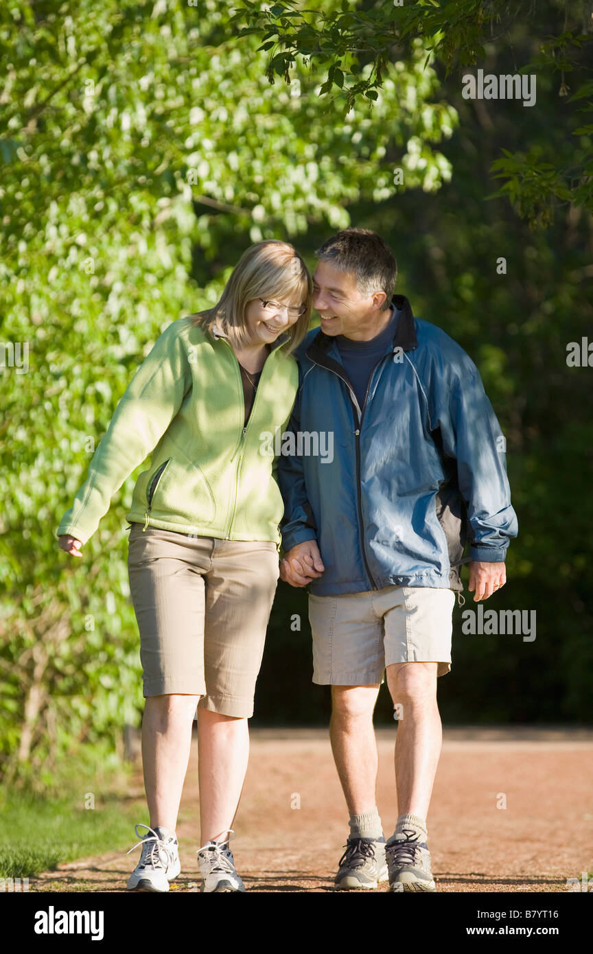 Couple going for a walk Stock Photo - Alamy