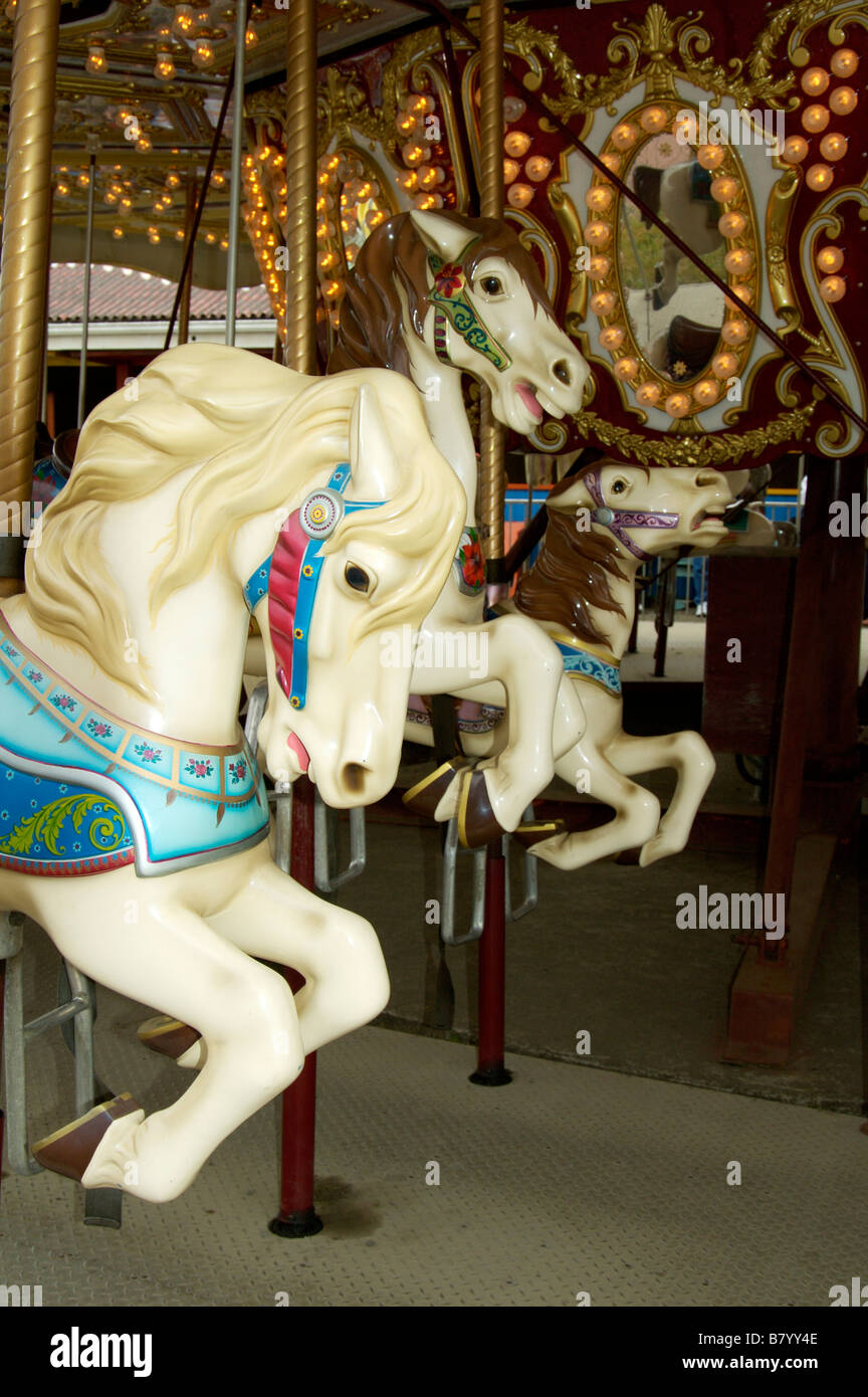 a carousel in an amusement park Stock Photo - Alamy