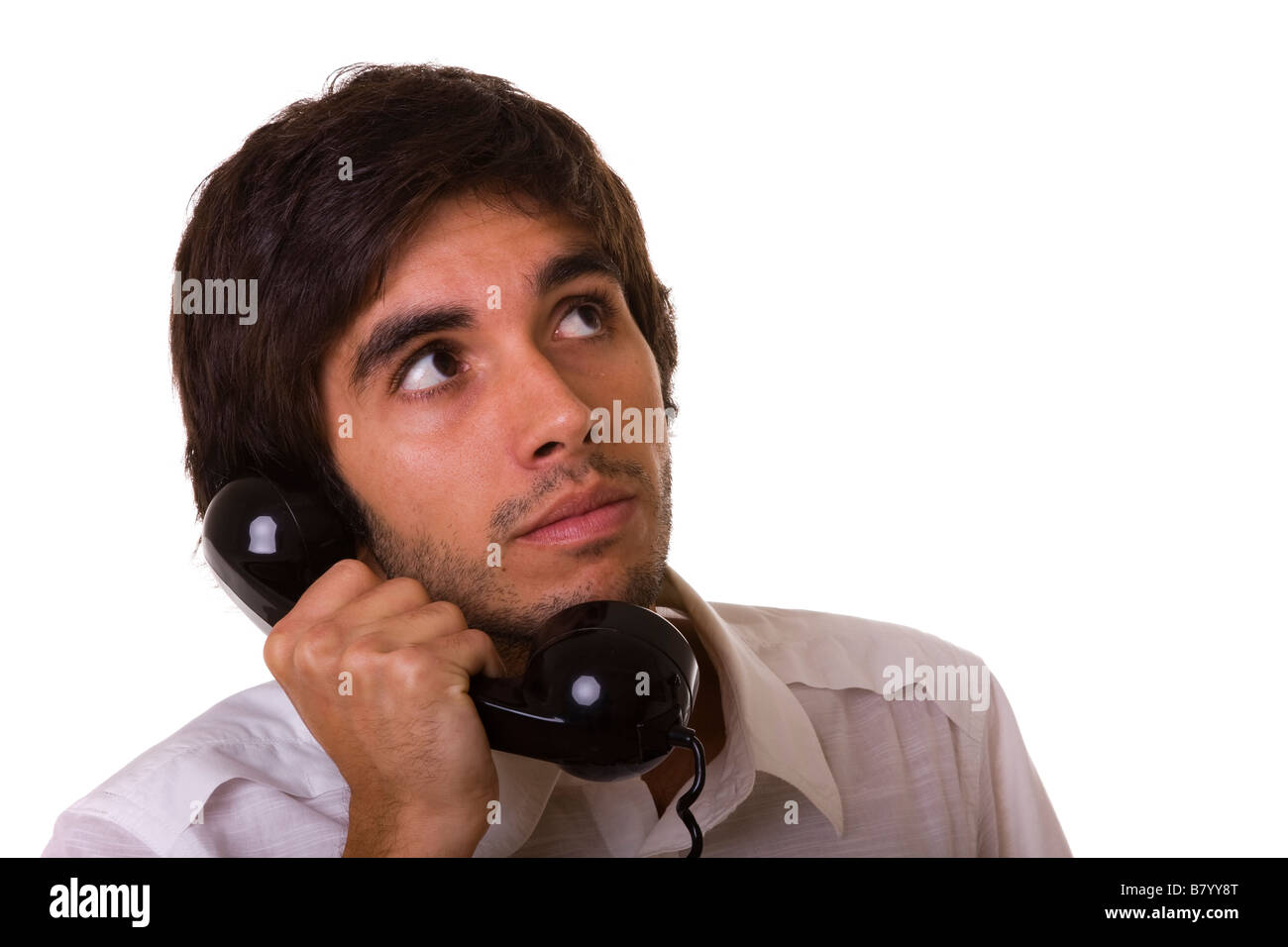 young men talking with a old telephone Stock Photo - Alamy