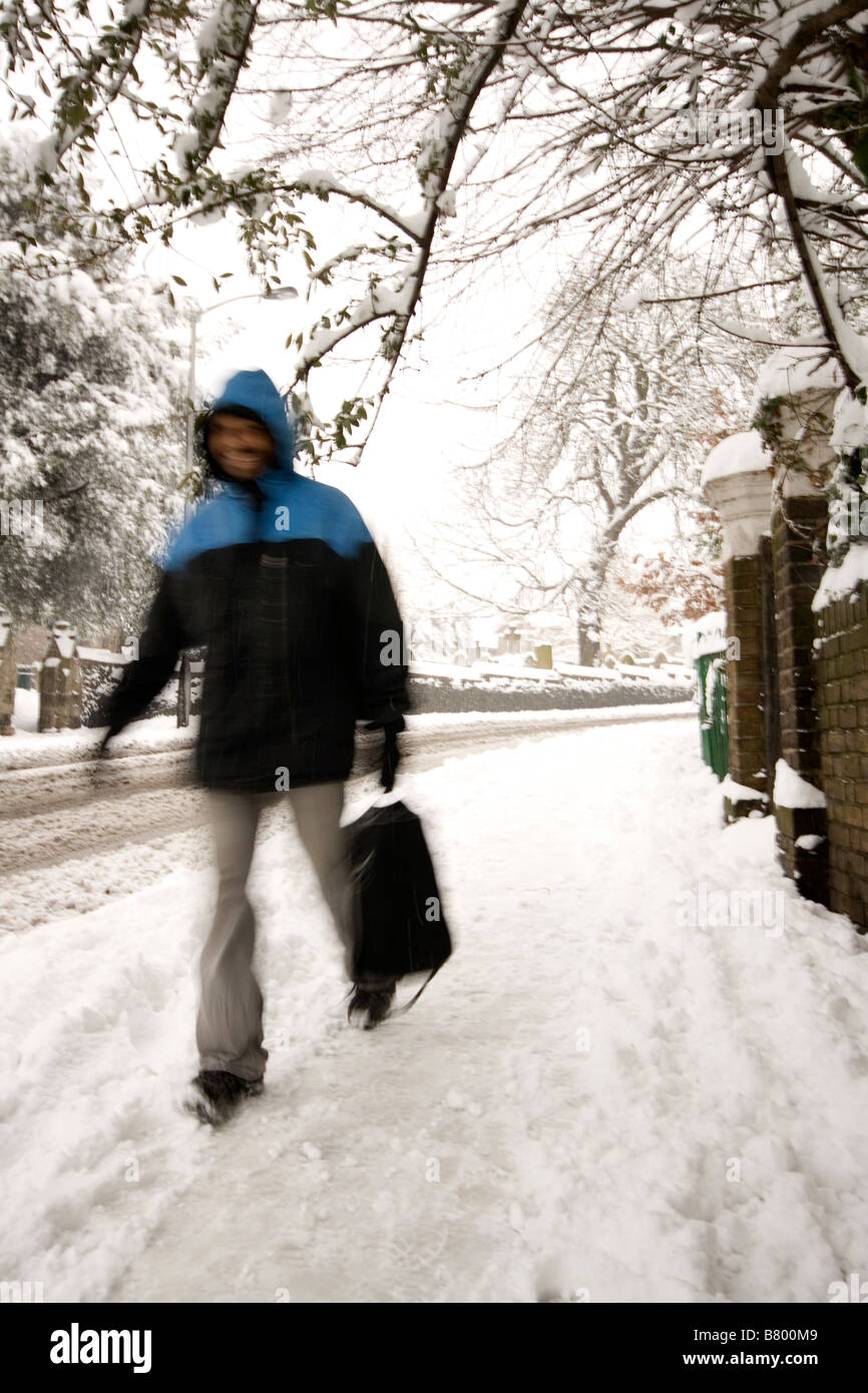 Walking through snow blizzard hi-res stock photography and images - Alamy