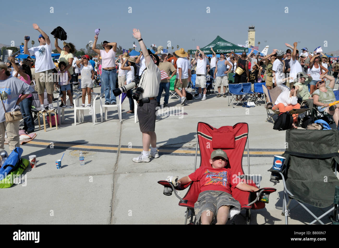 Crowds following aerial stunts Stock Photo - Alamy