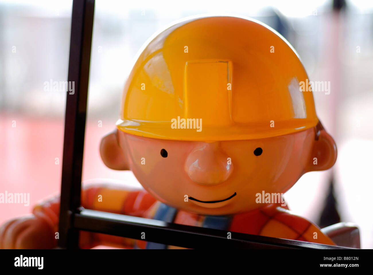Workman and digger children's ride Stock Photo - Alamy