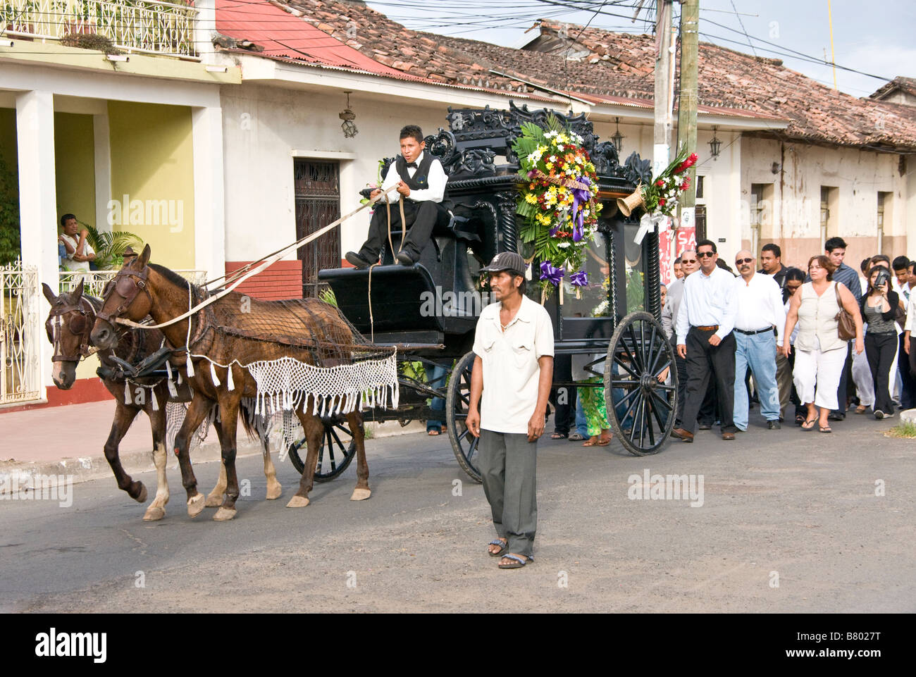 Granada, horse drawn hearse leading funeral procession Stock Photo - Alamy