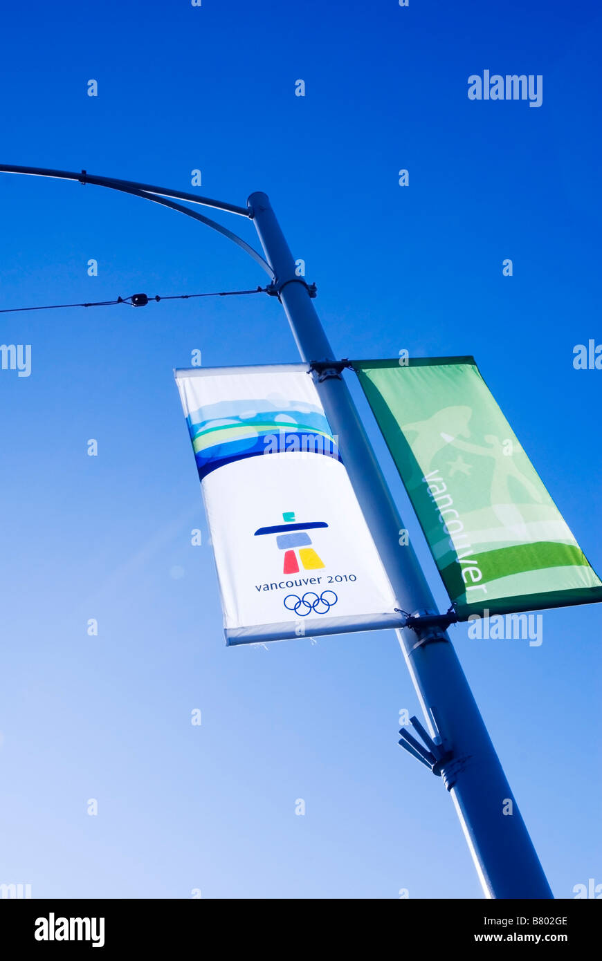 Official 2010 Winter Olympic banners on light pole in Vancouver ...