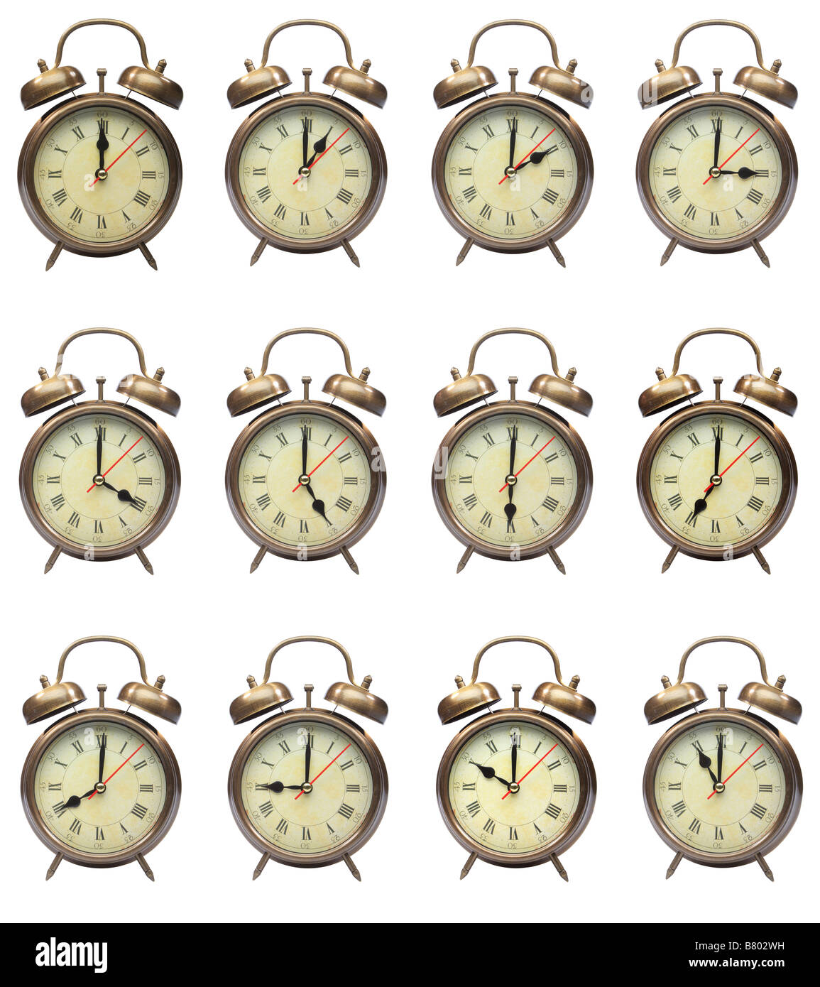 vintage alarm clocks isolated on white showing 24 hours of the day ...