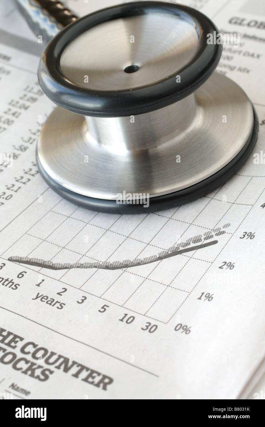 Stethoscope on newspaper financial chart Stock Photo - Alamy