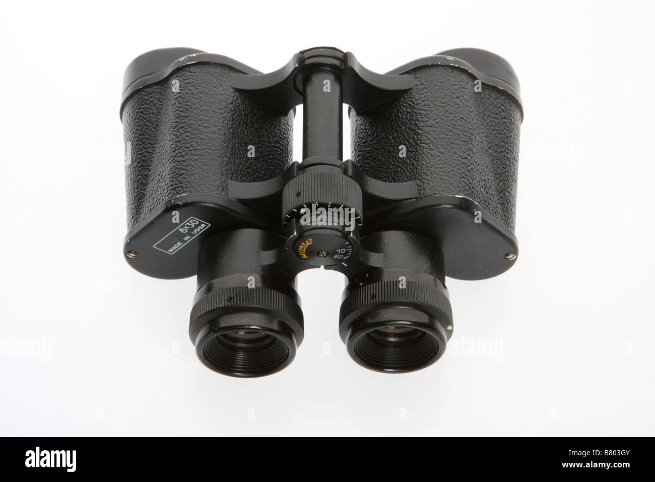 Old vintage soviet binoculars isolated on white shot from an angle ...