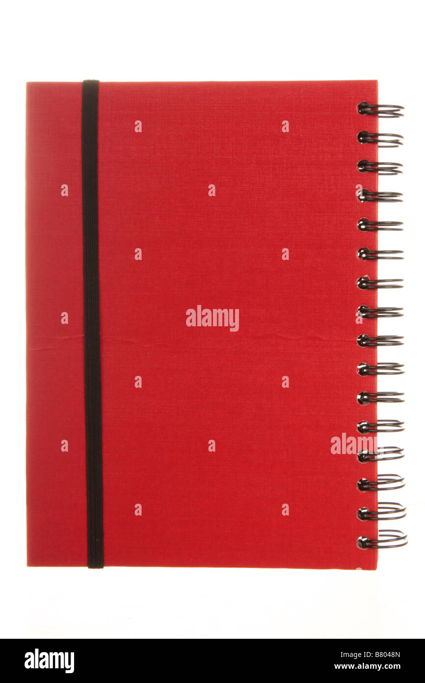 A red spiral notebook isolated on white Stock Photo - Alamy