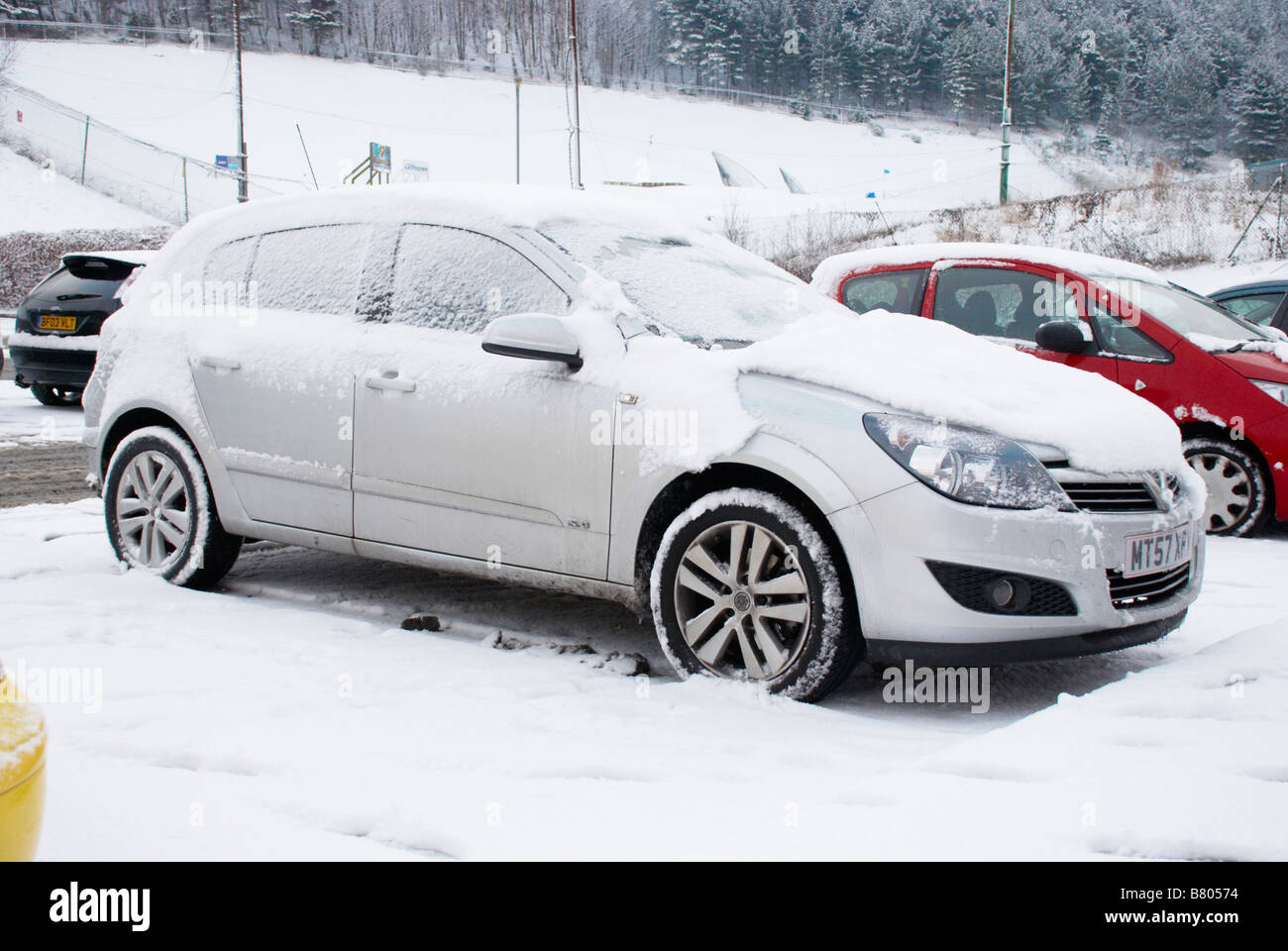 snow covered cars Stock Photo - Alamy