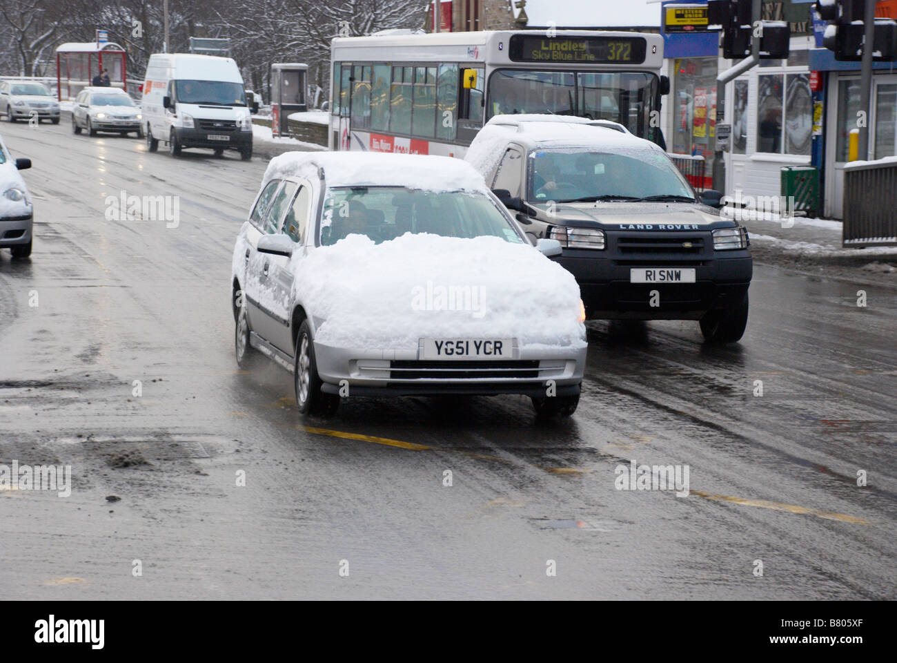 car in the snow Stock Photo - Alamy