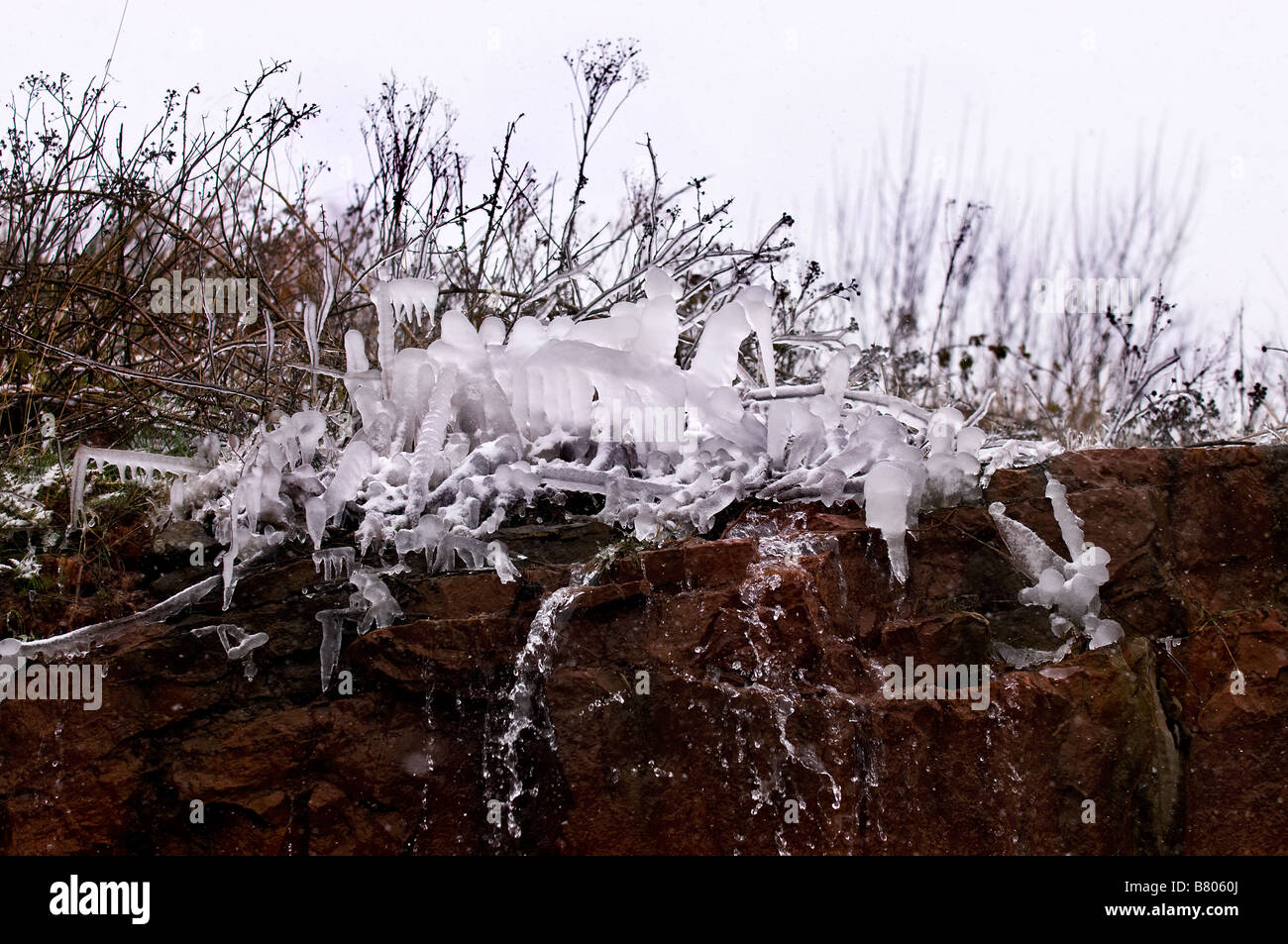 Ice icicles on rocks hi-res stock photography and images - Alamy