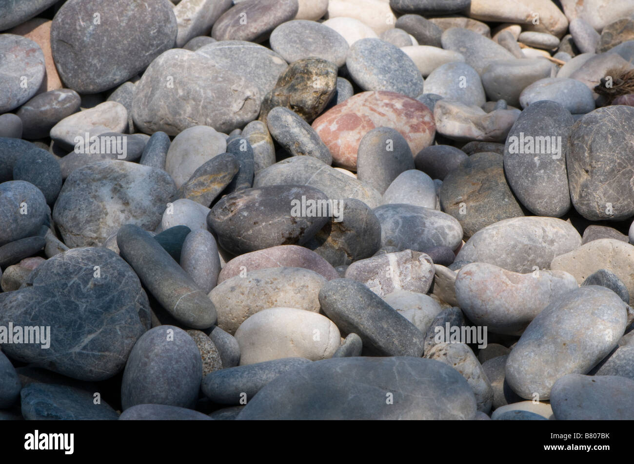 Chios beach with stones Stock Photo - Alamy