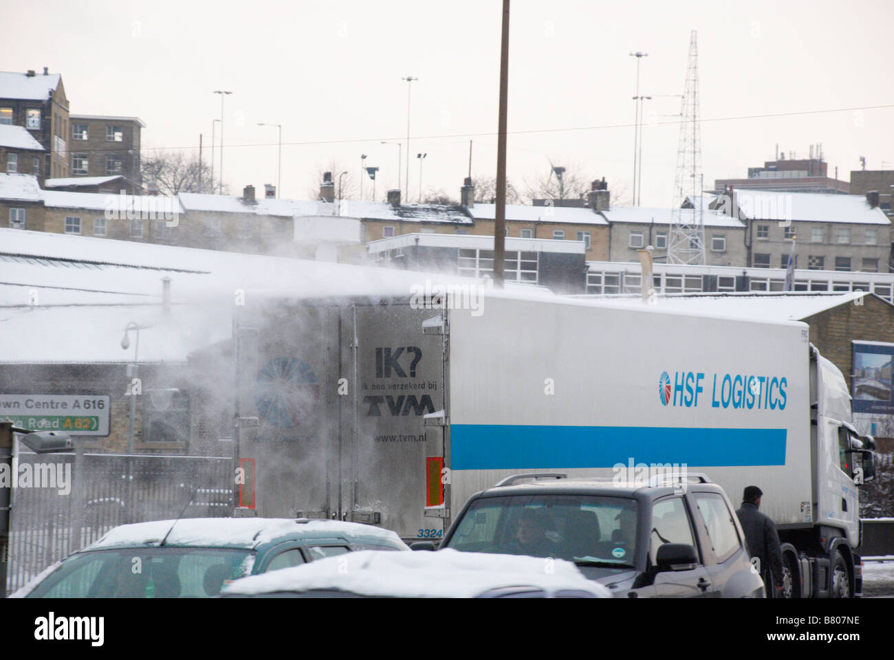 lorry with snow blowing off its roof Stock Photo - Alamy