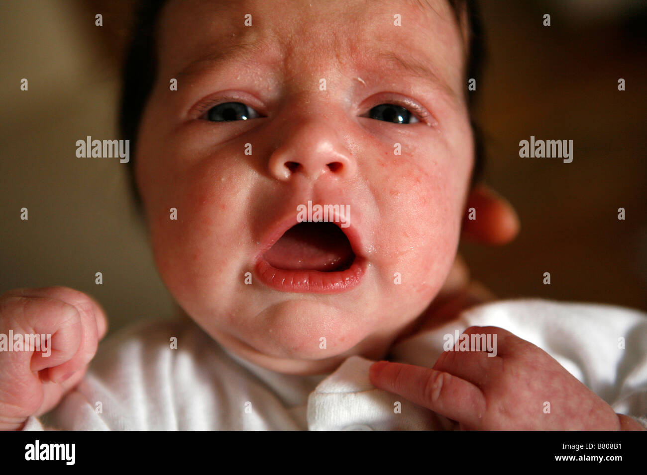 Crying baby face hi-res stock photography and images - Alamy