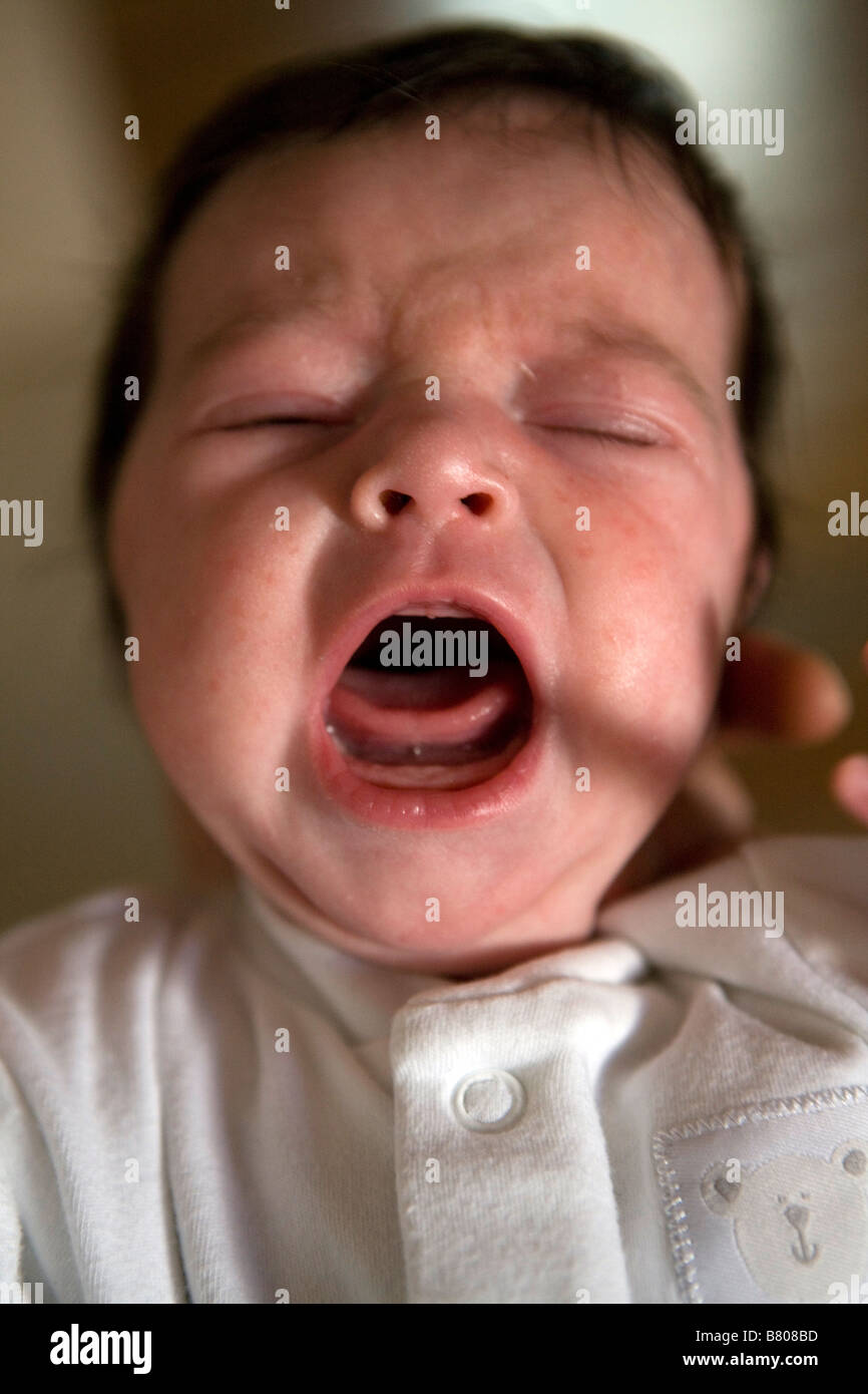 A baby crying Stock Photo - Alamy