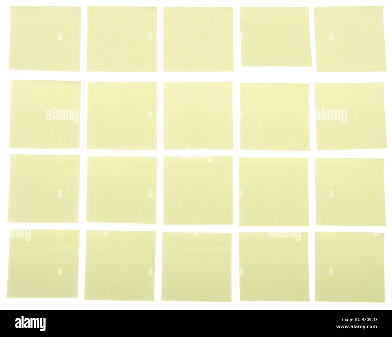Blank yellow post it notes isolated on white, spread out on white ...