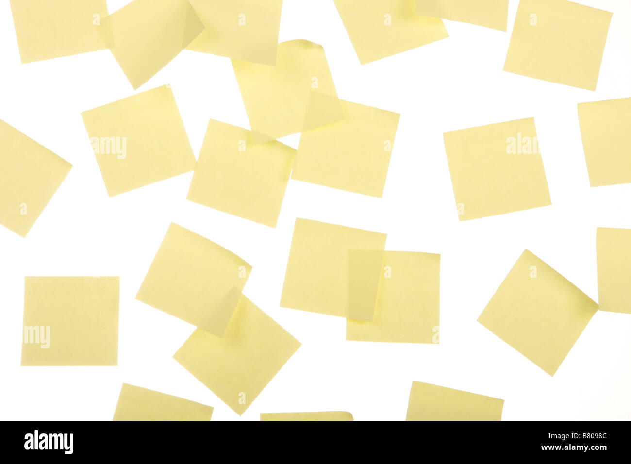 Blank yellow post it notes isolated on white, spread out on white ...