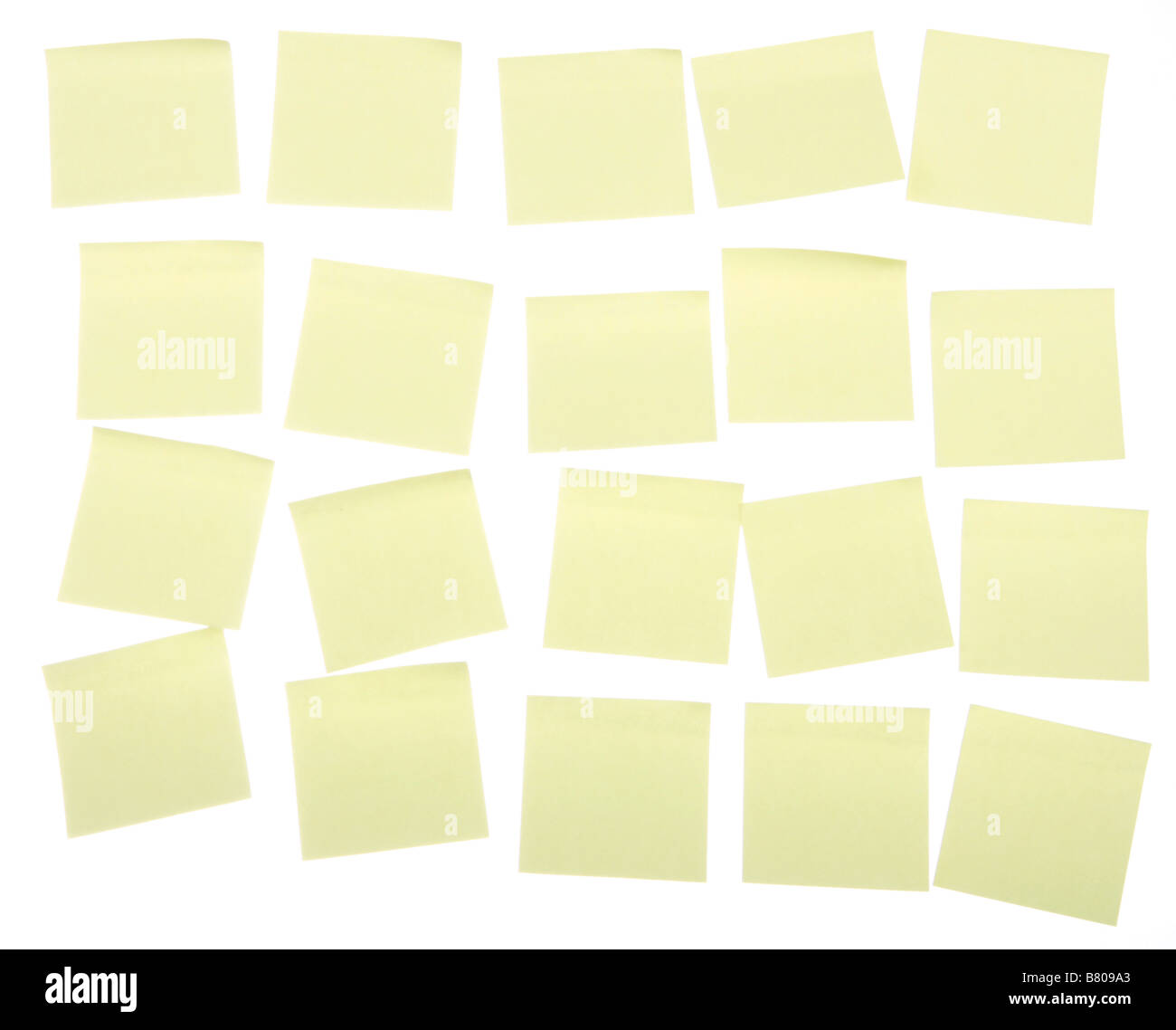Blank yellow post it notes isolated on white, spread out on white ...