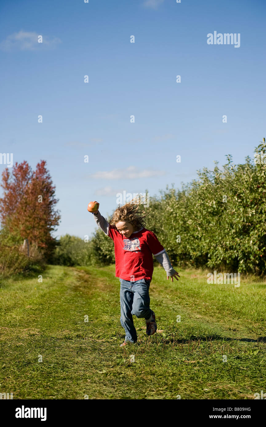 Child chasing dog hi-res stock photography and images - Alamy