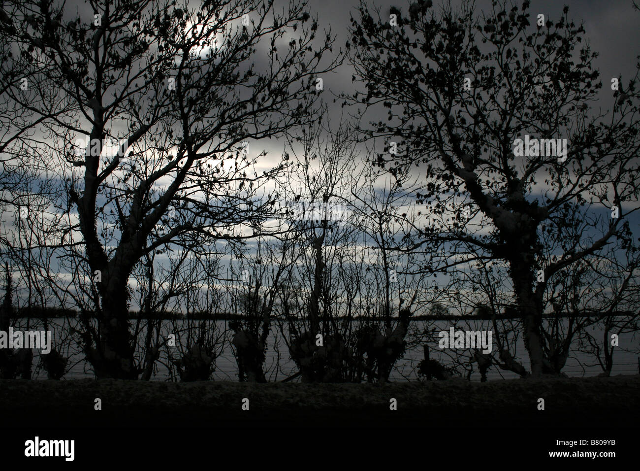 Silhouetted against dark clouds hi-res stock photography and images - Alamy