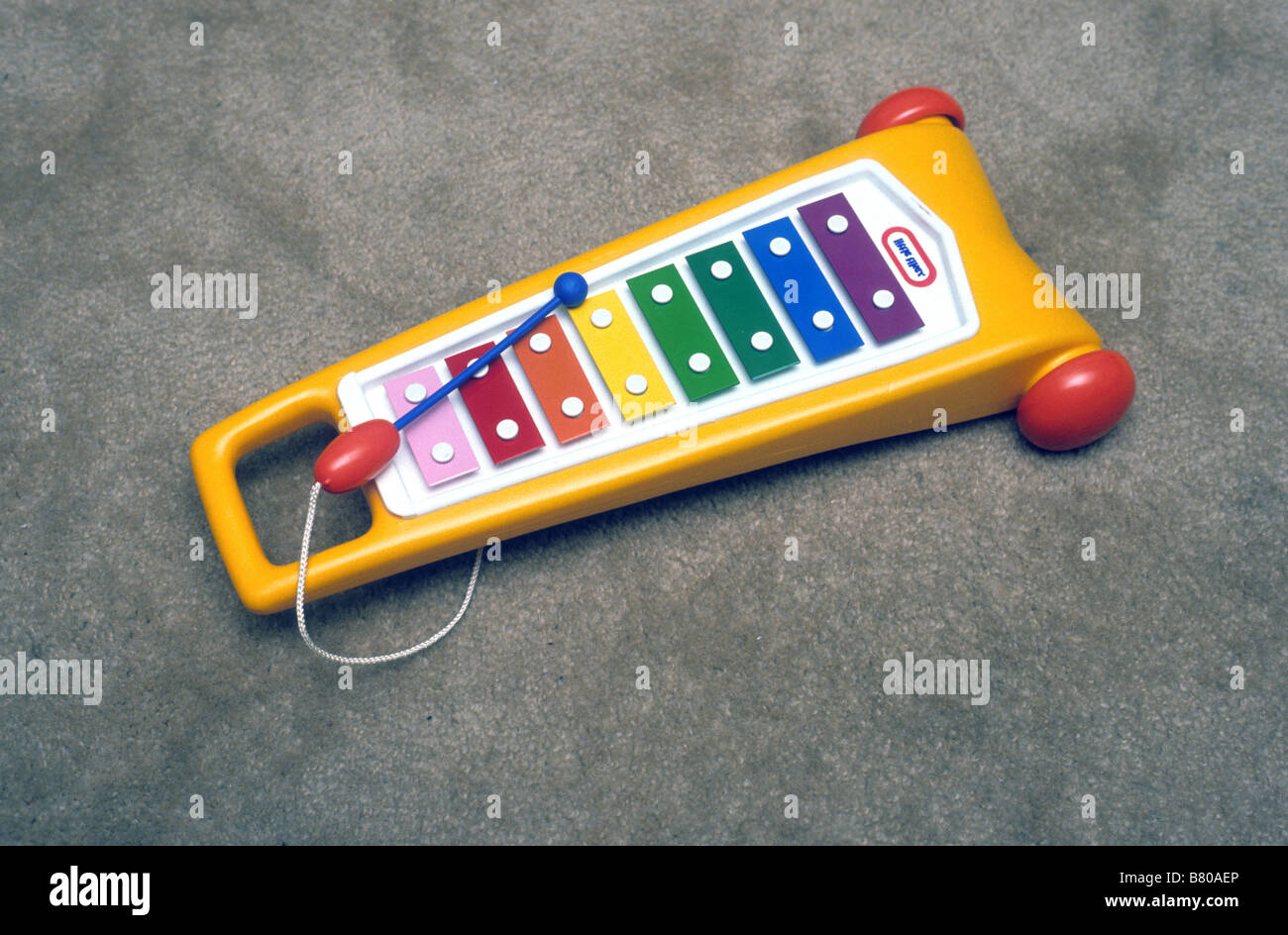 Toy xylophone with mallet Stock Photo - Alamy