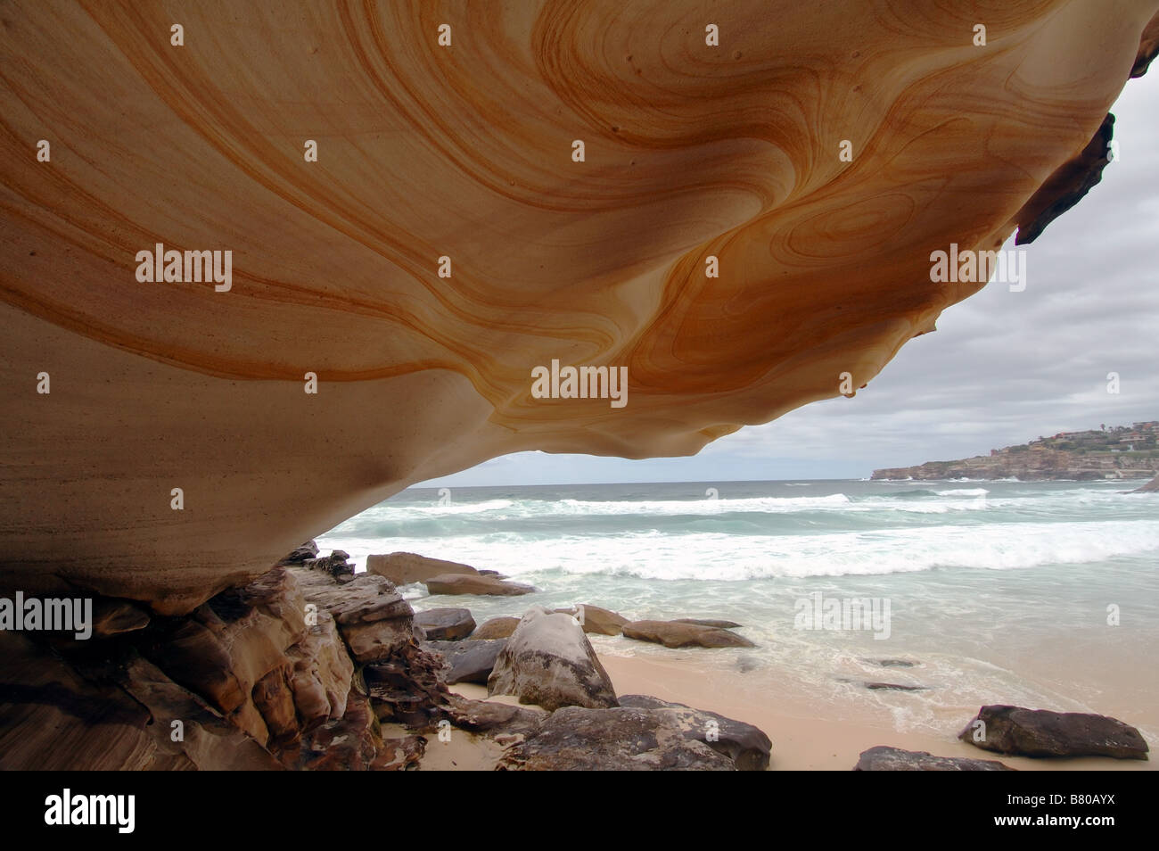 Eroded sandstone and surf on the beach at Bronte Sydney NSW Australia ...