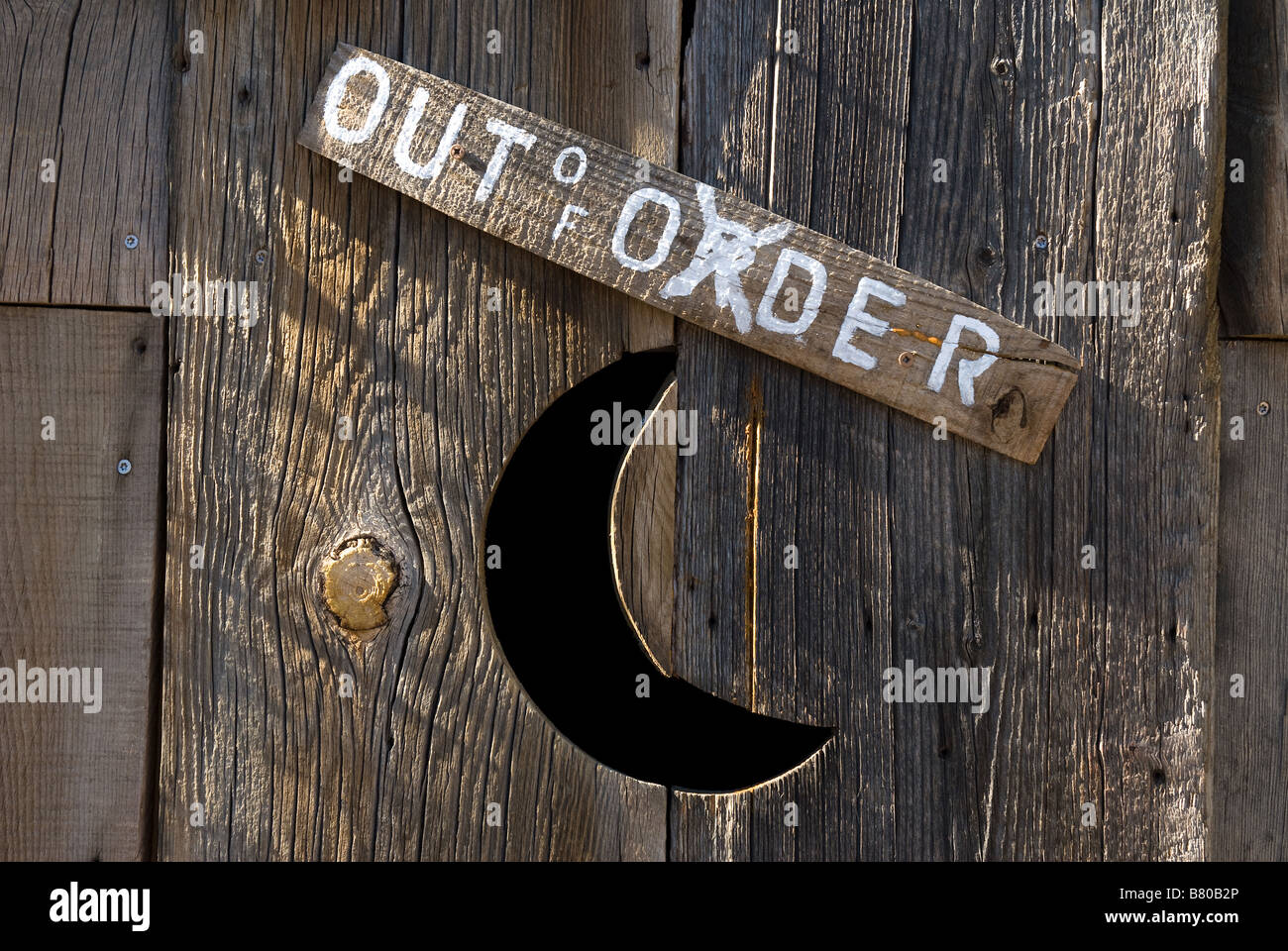 A close up of an old vintage outhouse vent Stock Photo - Alamy
