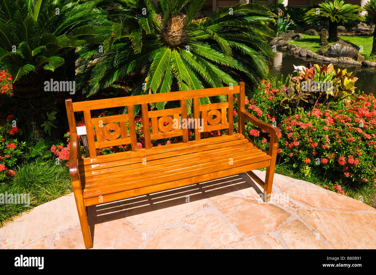 Bench and garden at the Kauai Marriott Resort Island of Kauai Hawaii ...