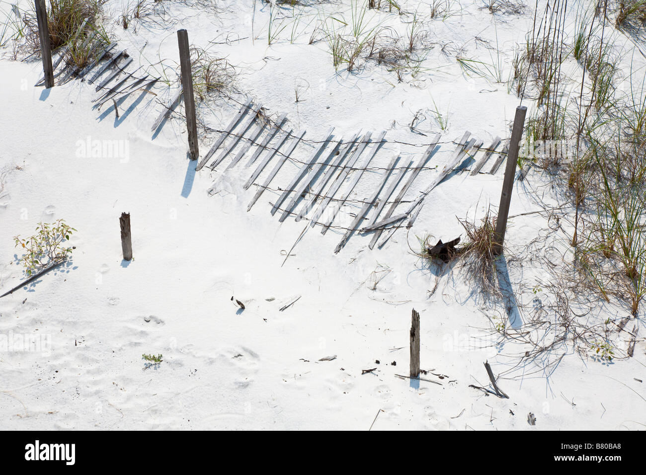 Sand dune erosion fence lying in white sand beach at St Joseph ...