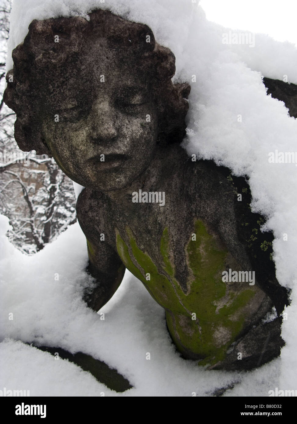 Statue in Snow Stock Photo - Alamy