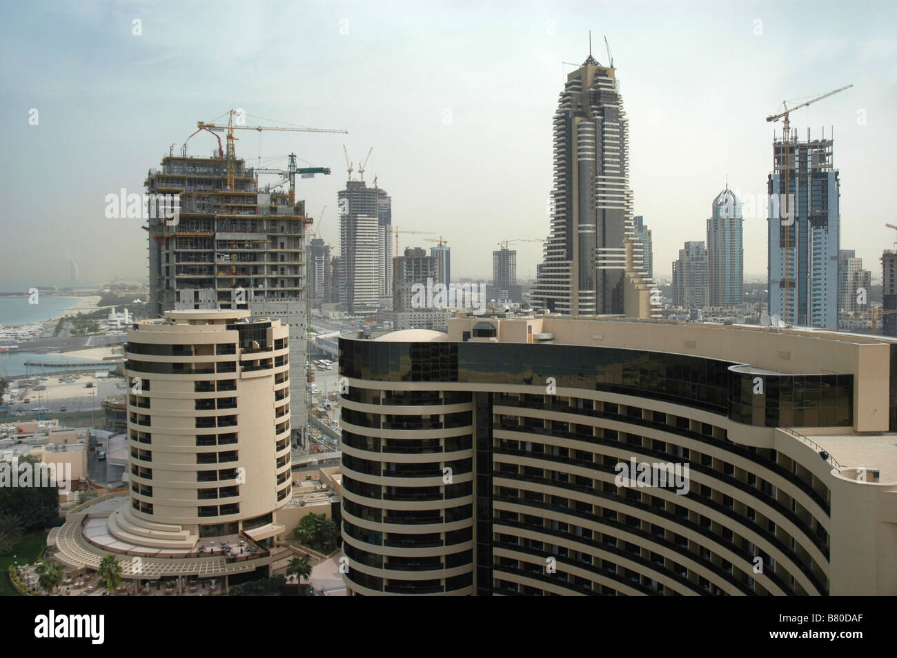 Construction cranes dubai marina hi-res stock photography and images ...