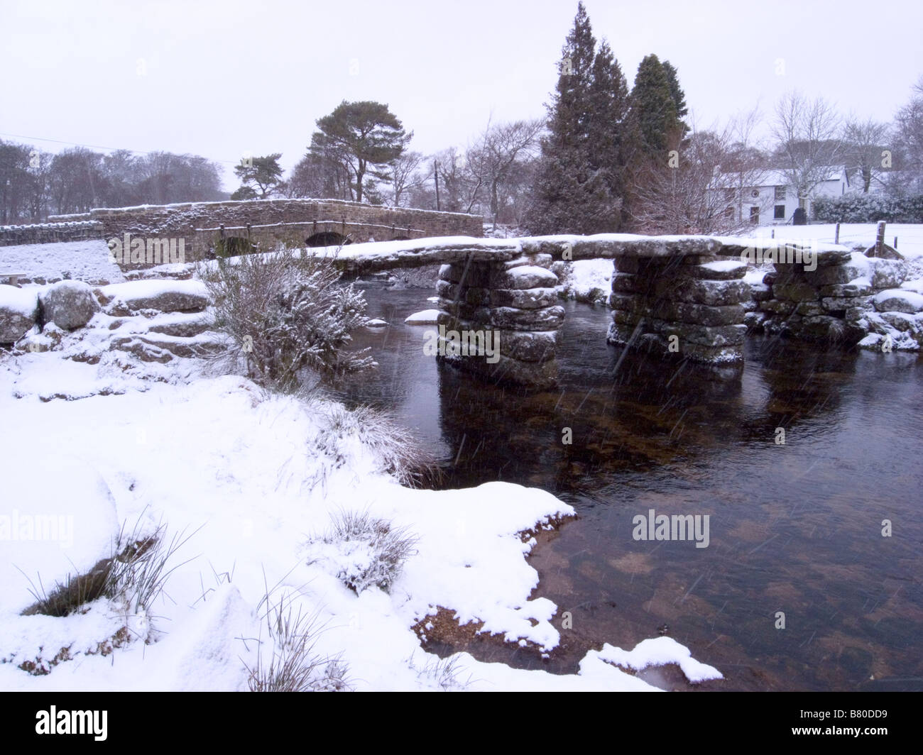 Ancient clapper bridge and road bridge at Postbridge Dartmoor after ...