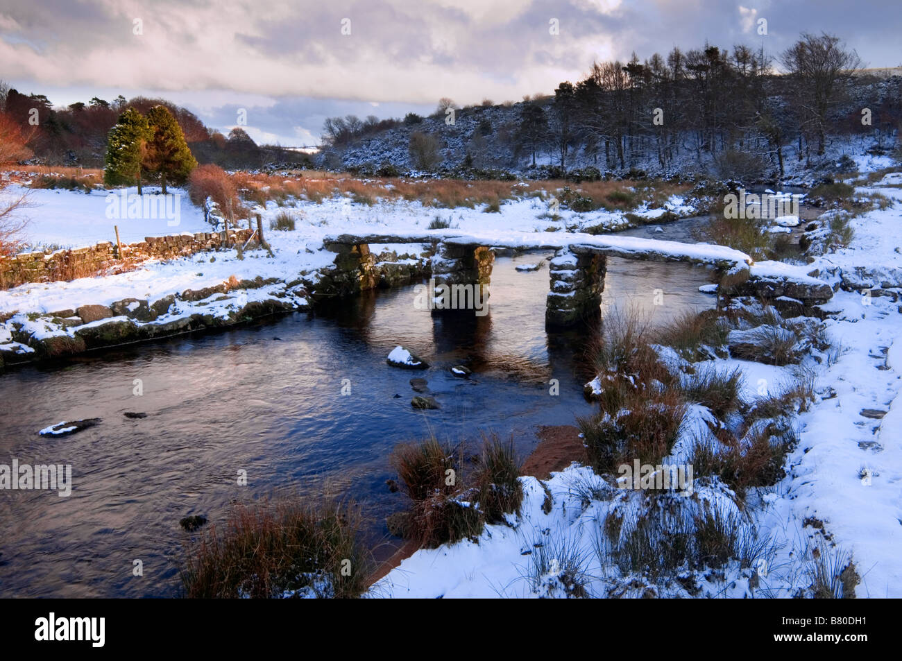 Ancient clapper bridge and road bridge at Postbridge Dartmoor after ...
