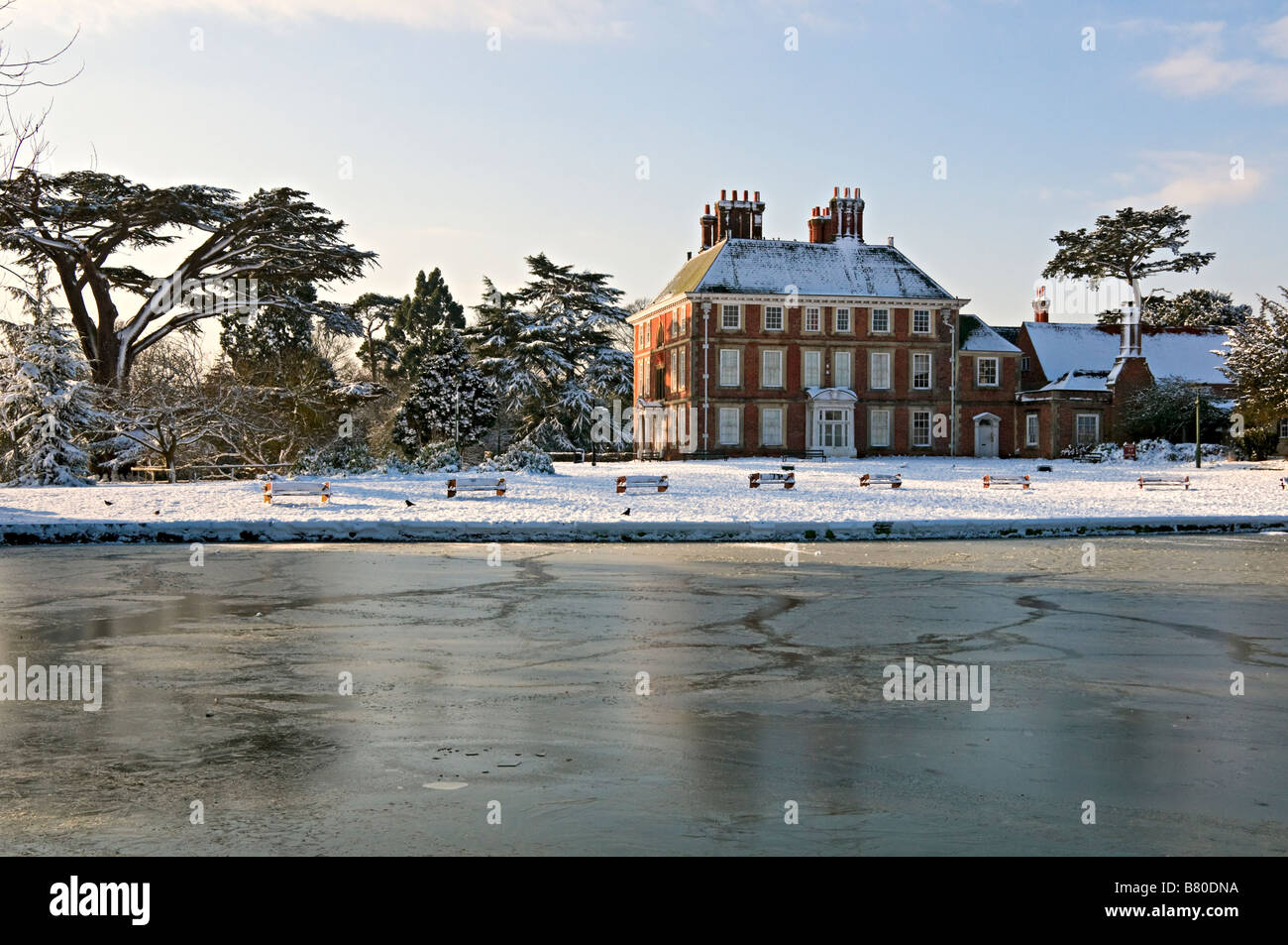 Snow covered Forty Hall and frozen pond Enfield UK Stock Photo - Alamy
