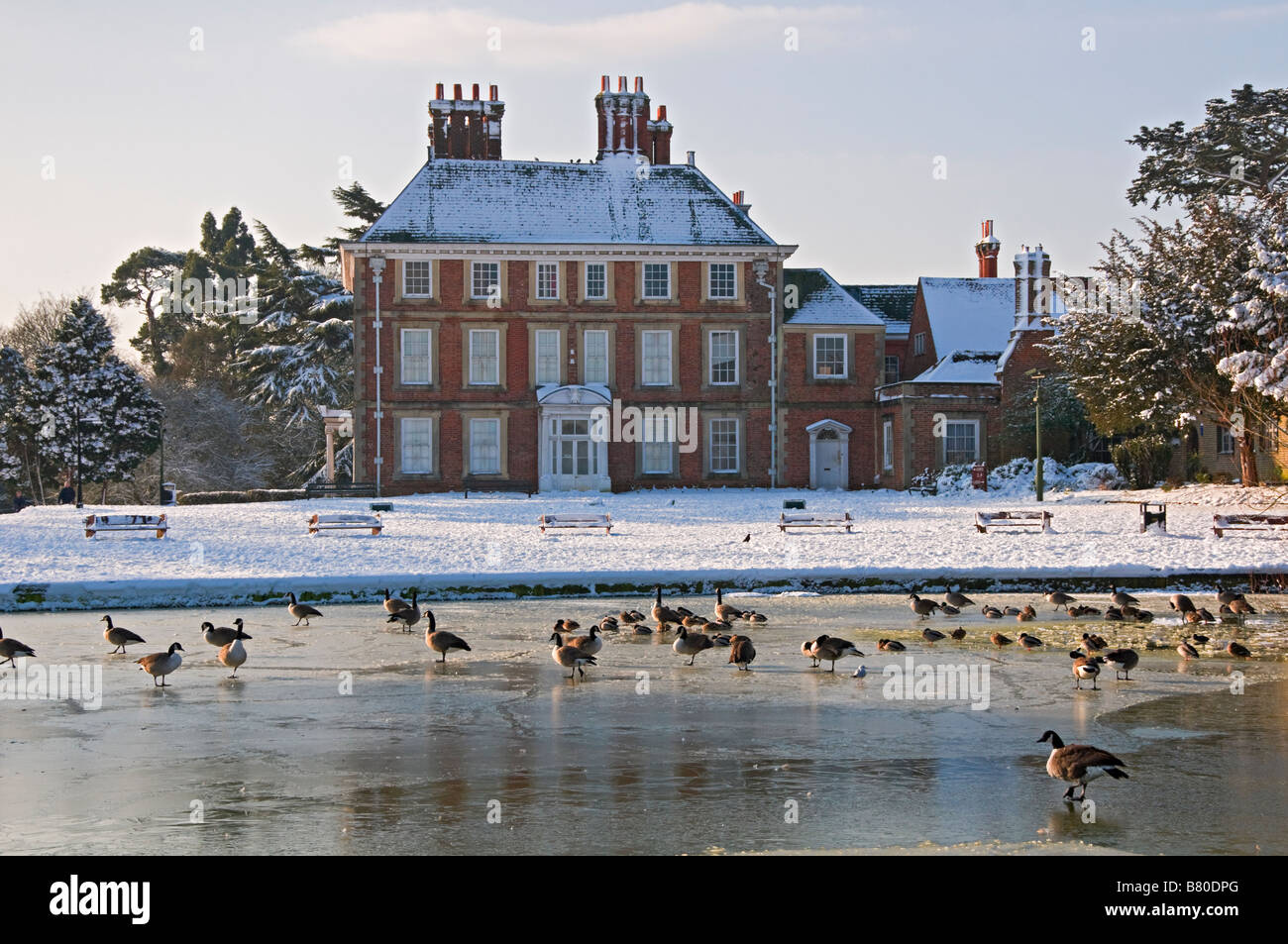 Snow covered Forty Hall and frozen pond Enfield UK Stock Photo - Alamy