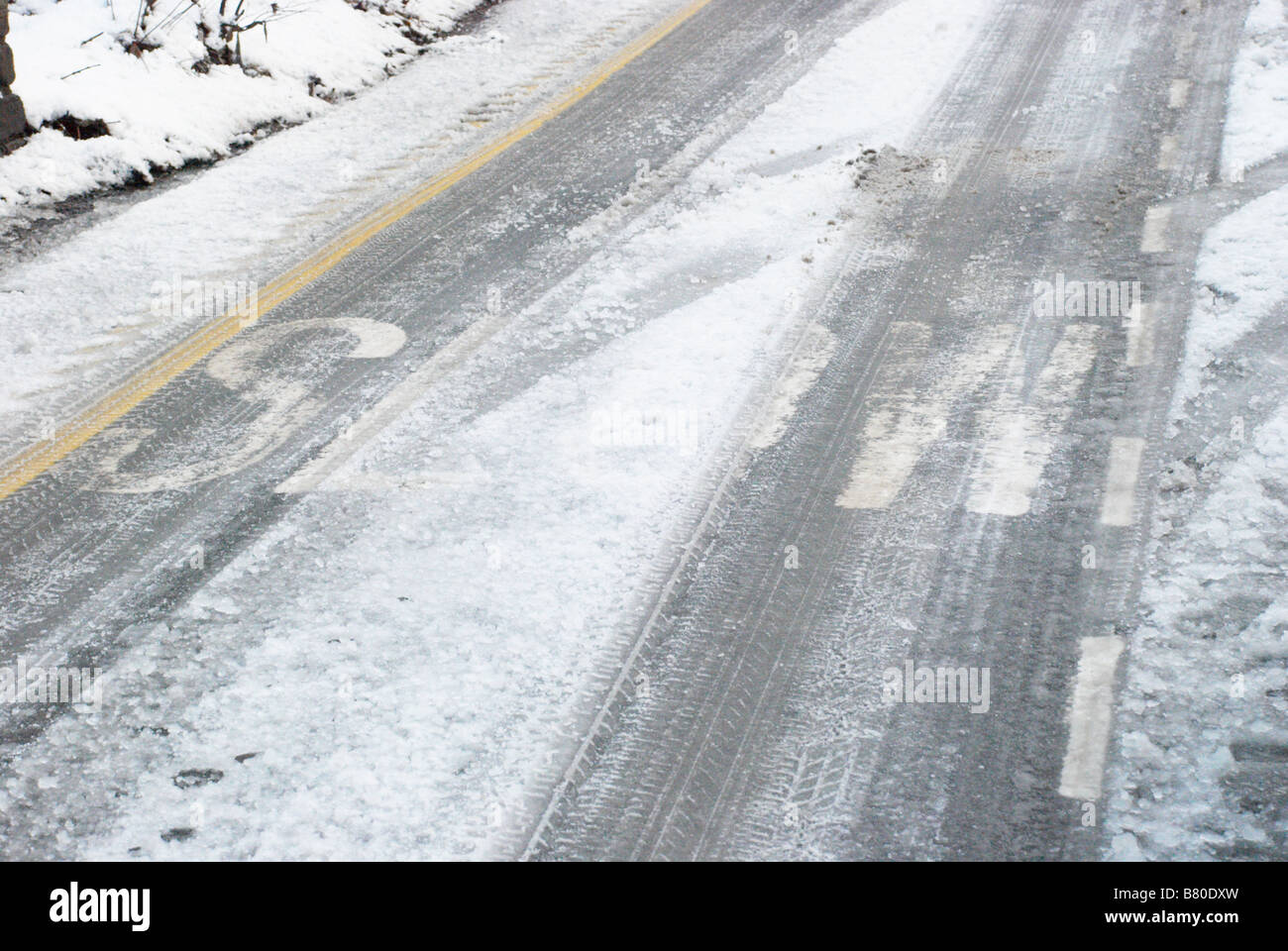 Uk slow road markings hi-res stock photography and images - Alamy