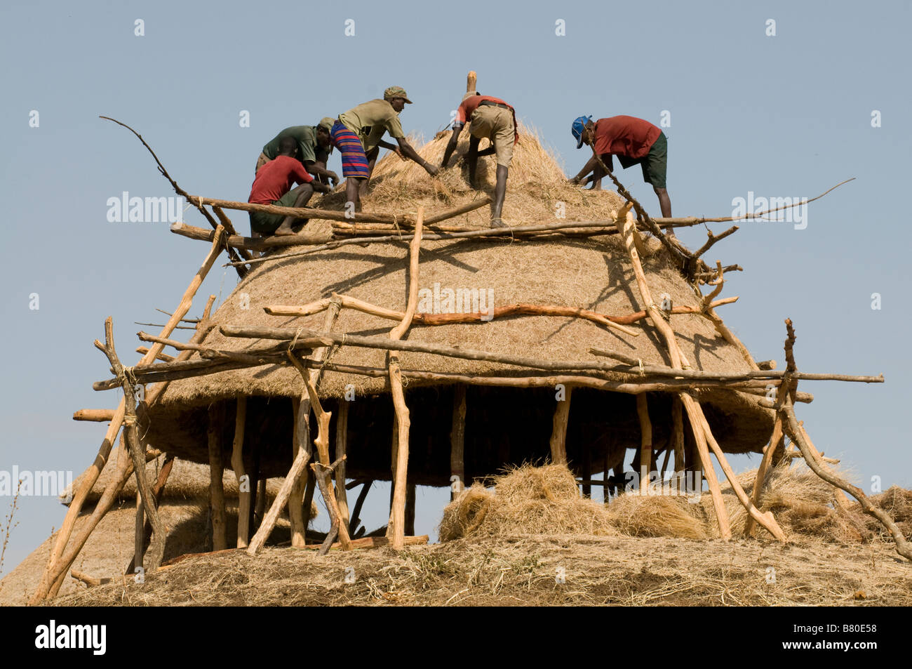 Workers working on the roof of Gezahegne Woldu s Compund a holy kraal ...