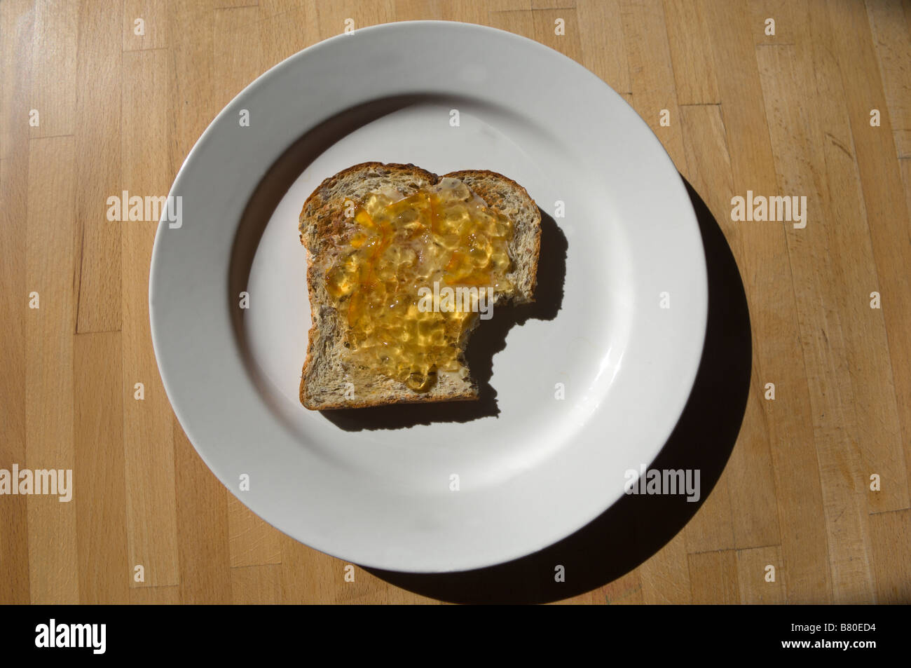 Toast bread on white plate hi-res stock photography and images - Alamy