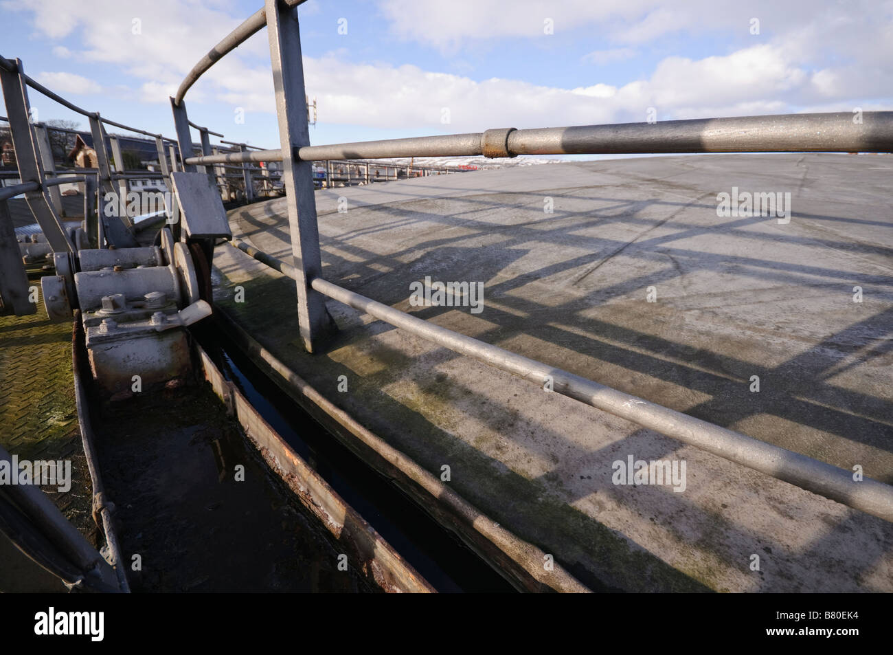 Top of gas tower showing guard rail and roller/riser mechanism Stock ...